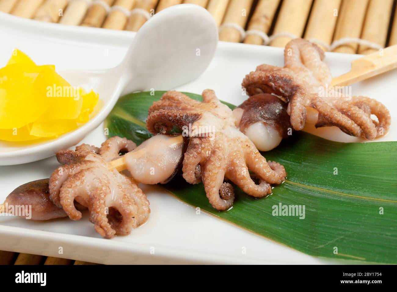 Japanese octopus skewered Stock Photo - Alamy