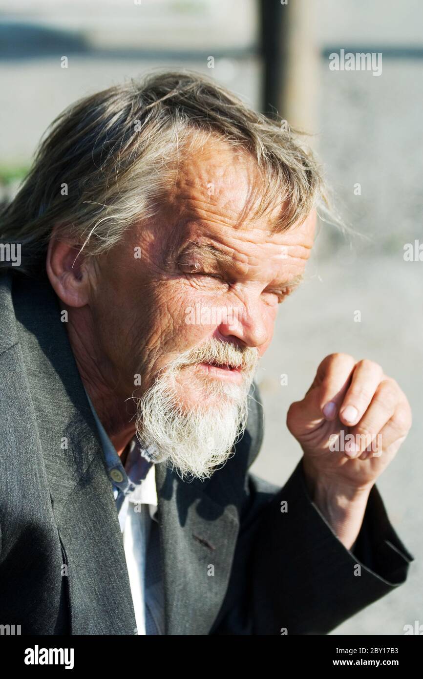 Homeless old man Stock Photo - Alamy