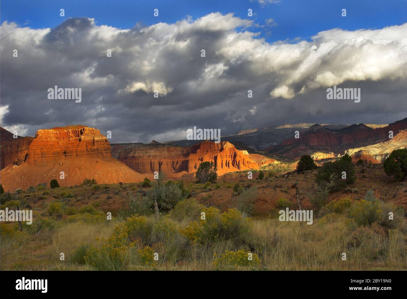 Red rocks and rain clouds Stock Photo - Alamy