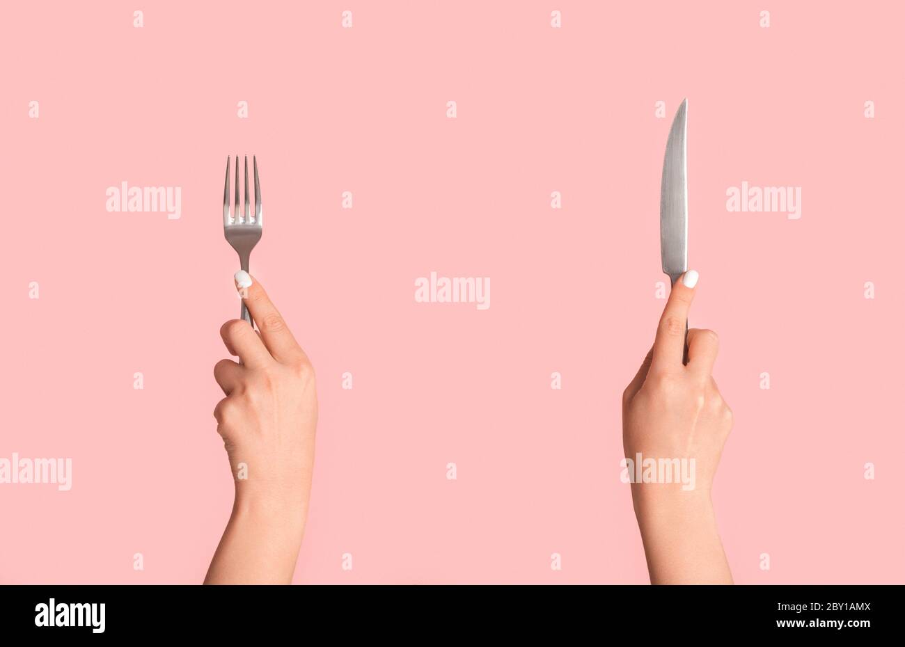 Female knife fork hands cutlery hi-res stock photography and images - Alamy