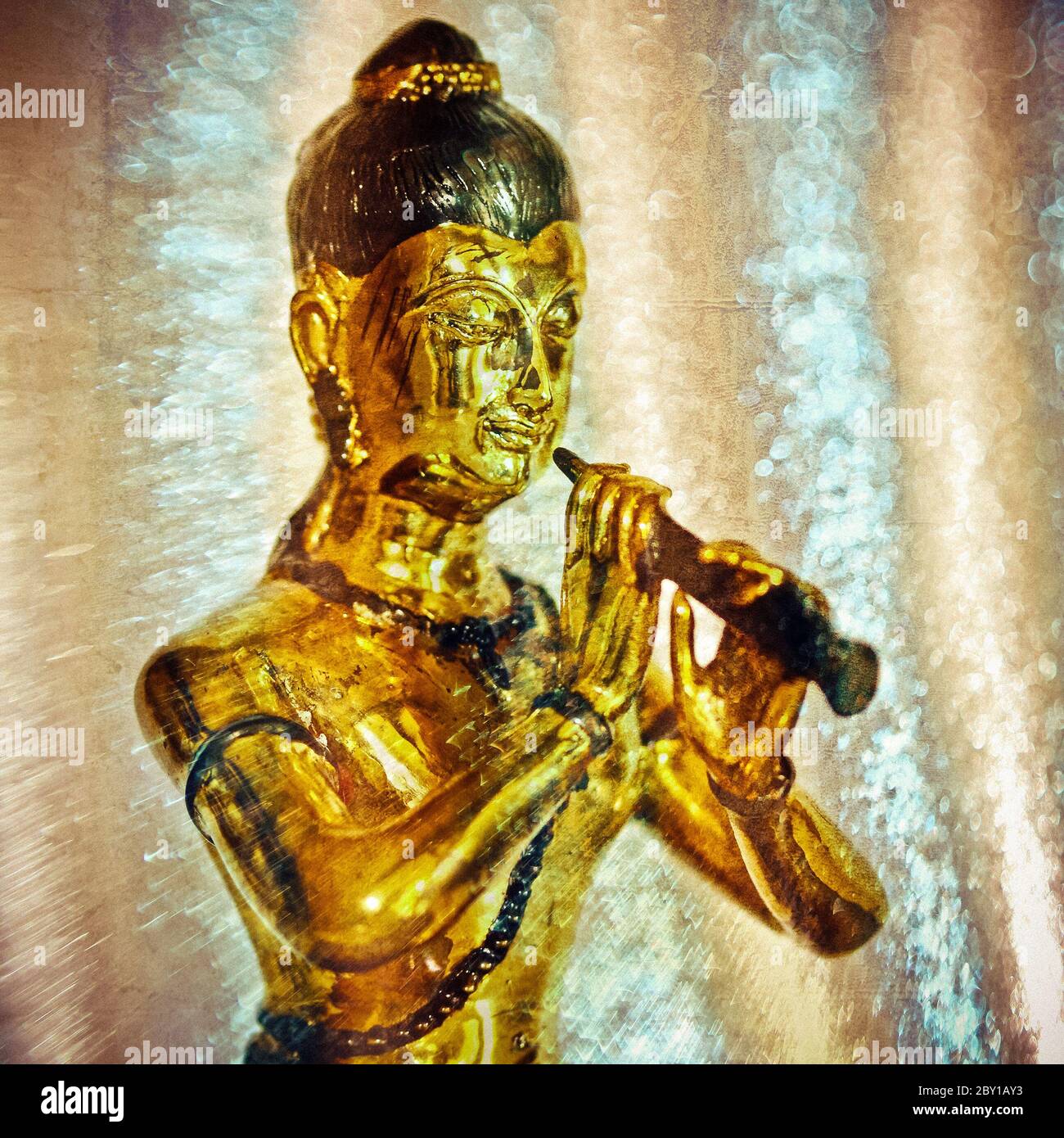 shimmering and flute-playing monk Stock Photo - Alamy
