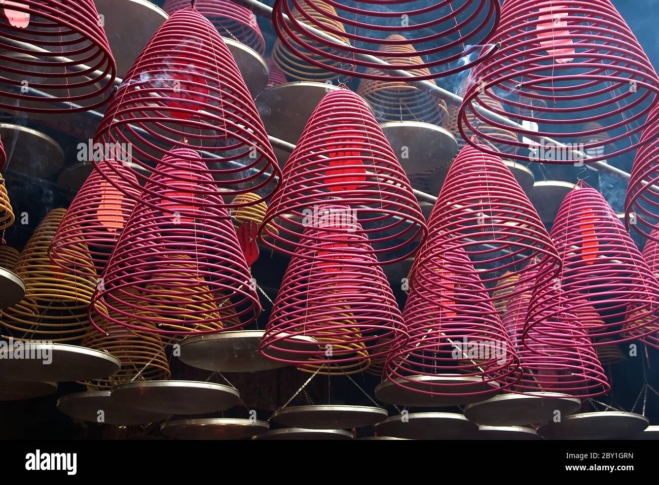 Red incense burners Stock Photo - Alamy