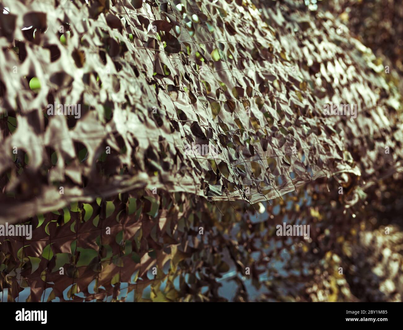 Camouflage mesh hidden russian military objects Stock Photo - Alamy