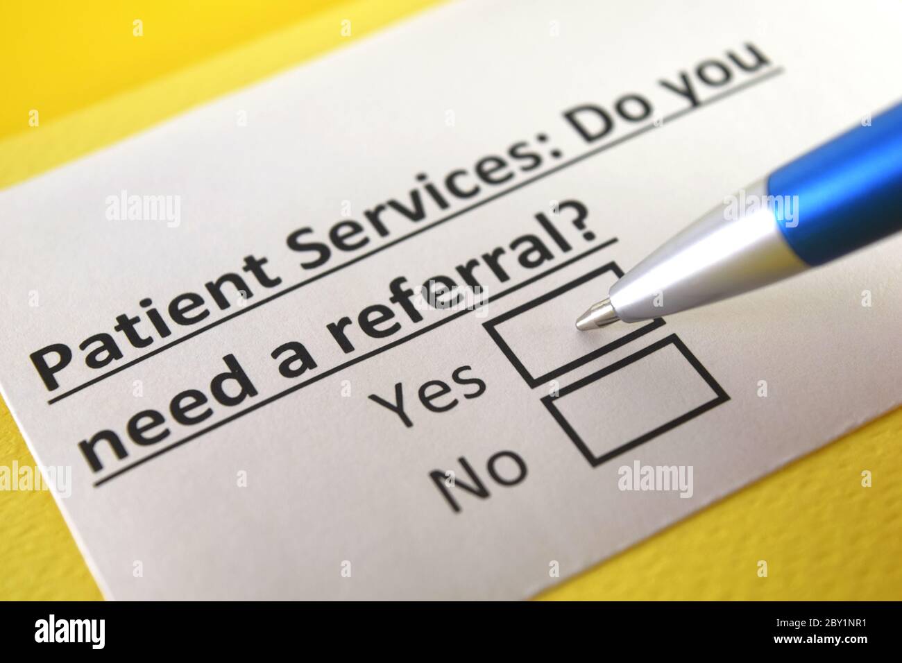 One person is answering question about patient services Stock Photo - Alamy