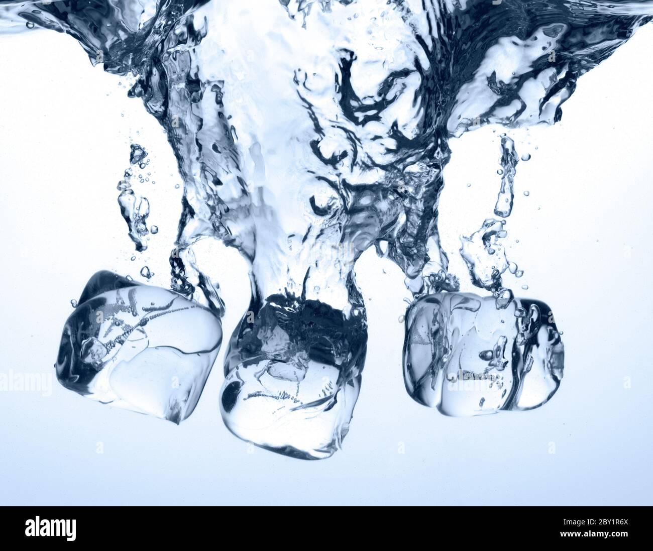 ice cube dropped Stock Photo - Alamy