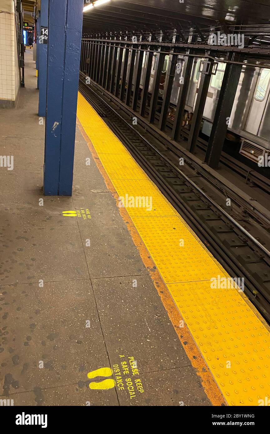 New York, NY, USA. 8th June, 2020. Yellow-footed markers help commuter ...