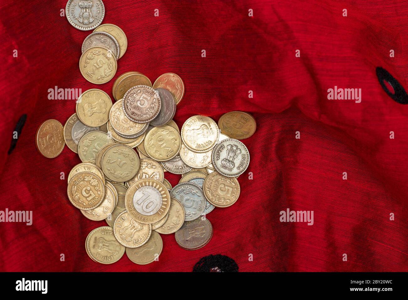 Indian five and ten rupee coins are kept in a red cloth Stock Photo - Alamy