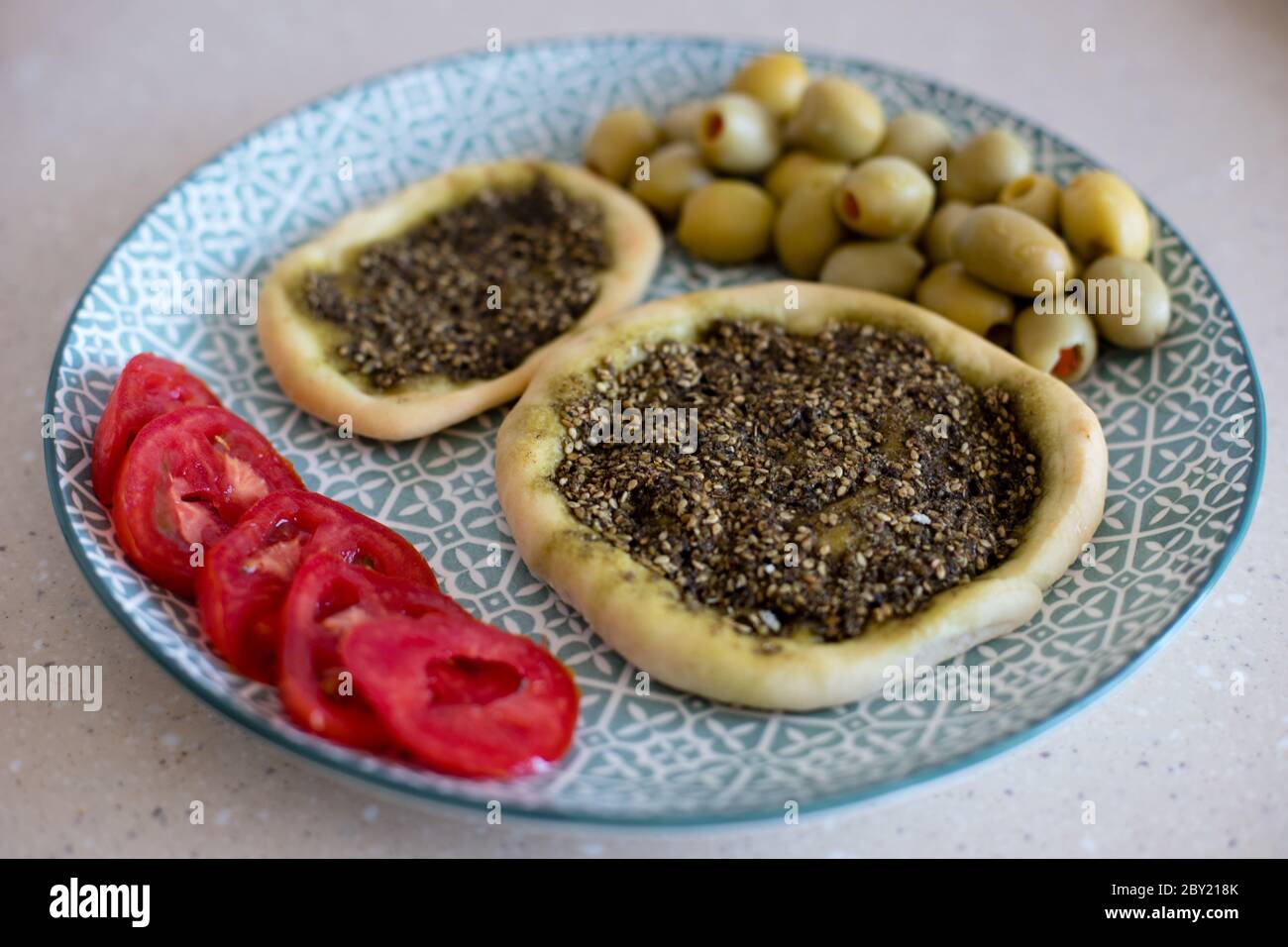 Close up photo of Manaqish b'il Za'atar, a popular Leventine dish ...