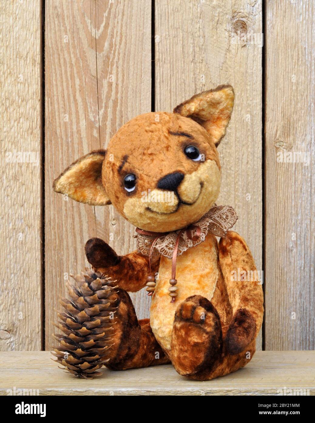 Ron fox on the background of a wooden wall Stock Photo - Alamy