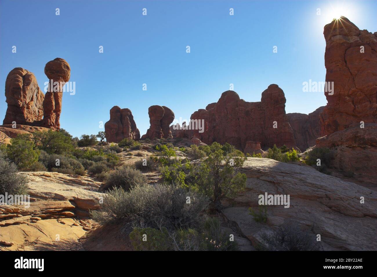 Statues from a red stone Stock Photo - Alamy