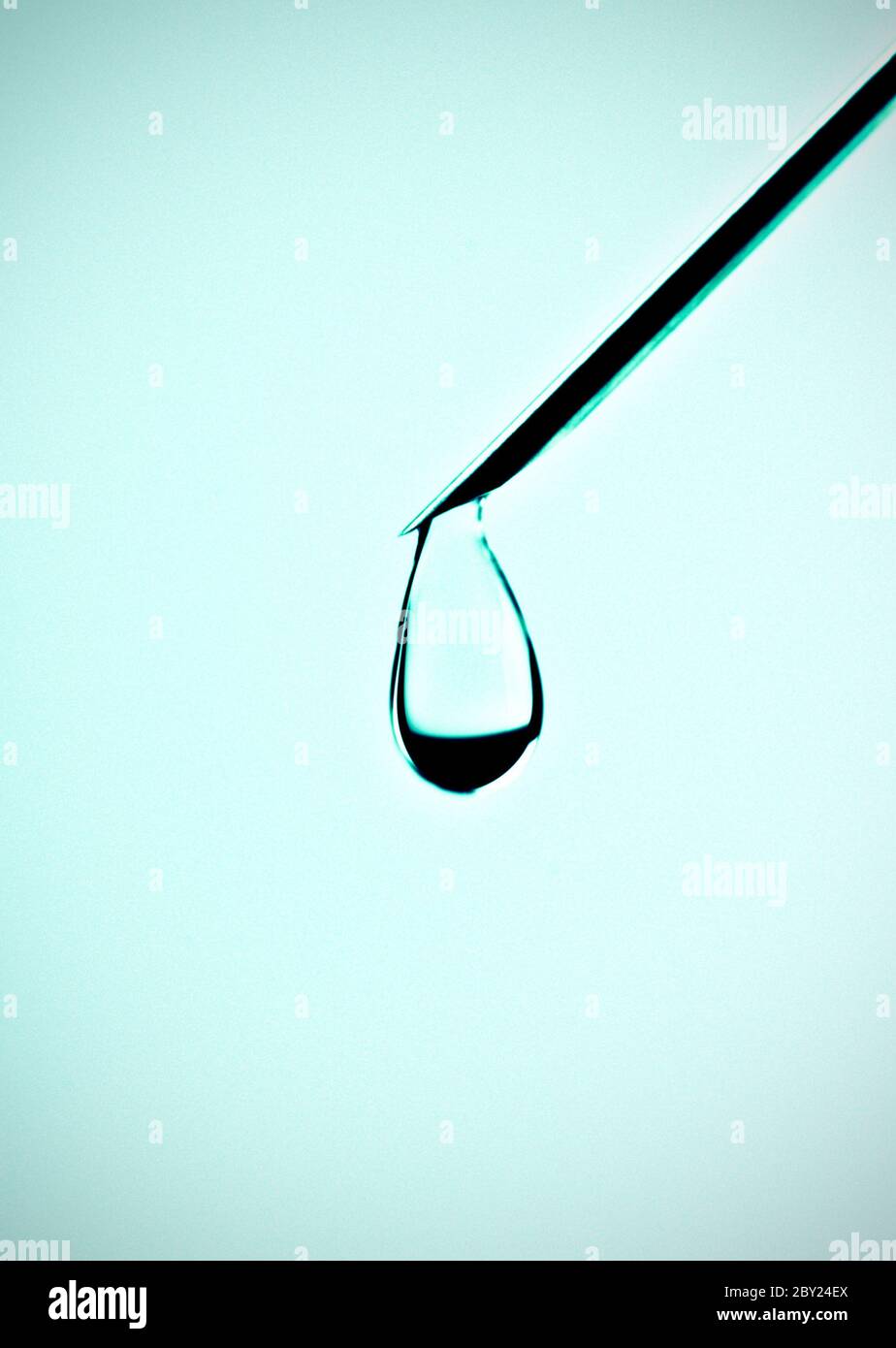 drop on the tip of needle Stock Photo - Alamy