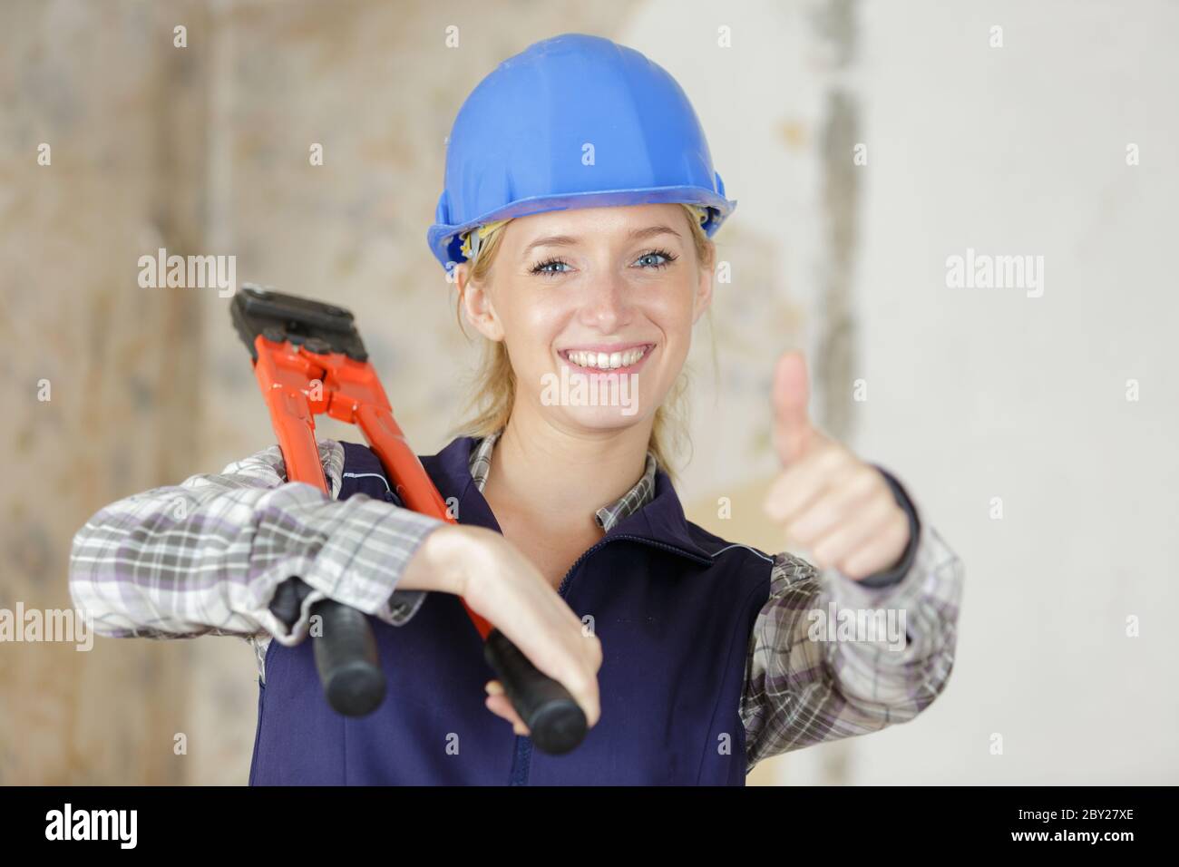Engineer in white helmet shows hi-res stock photography and images - Alamy
