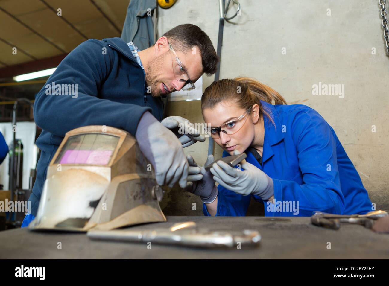 female apprentice welder Stock Photo - Alamy