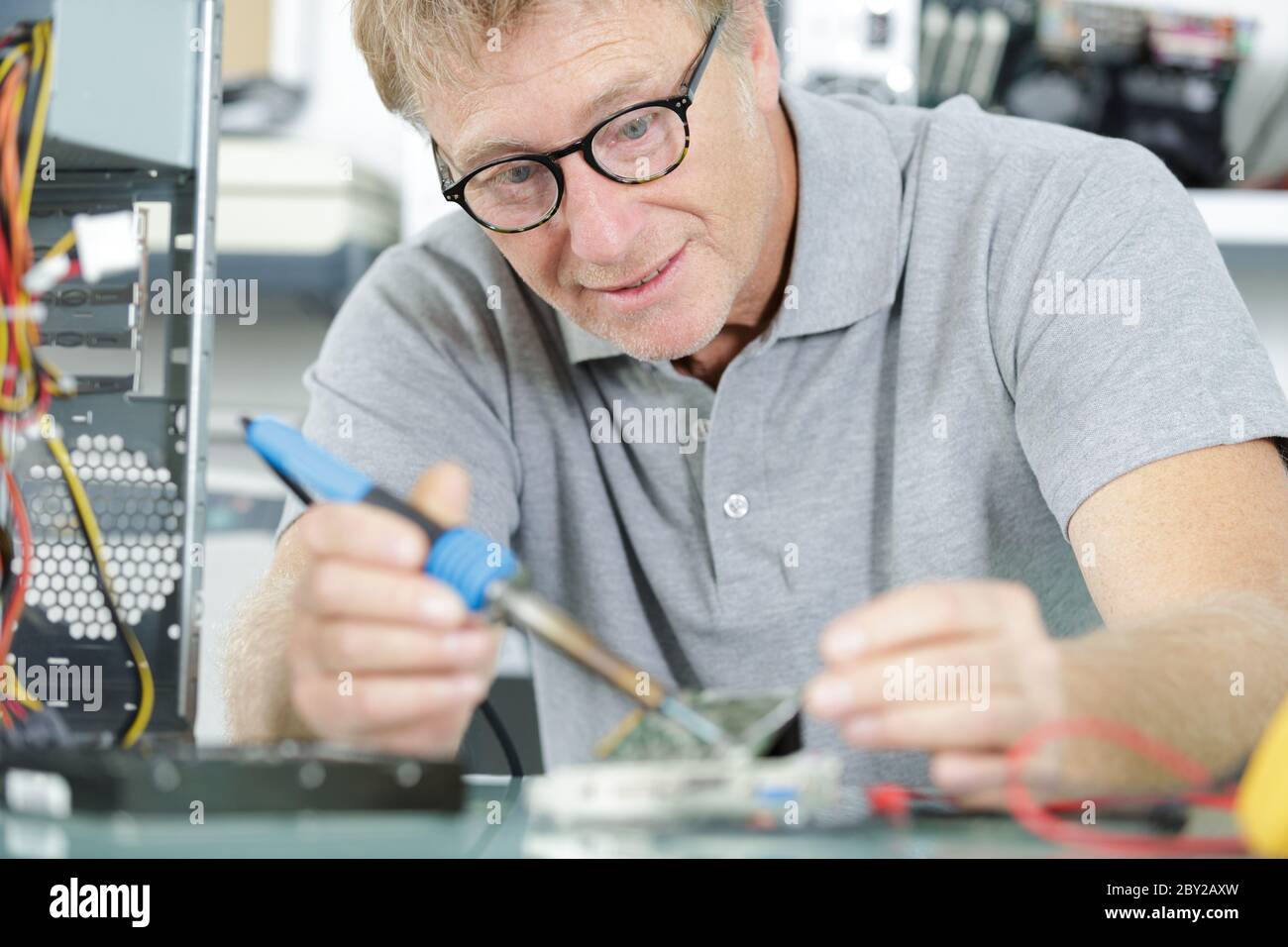 engineer working on circuit board Stock Photo - Alamy