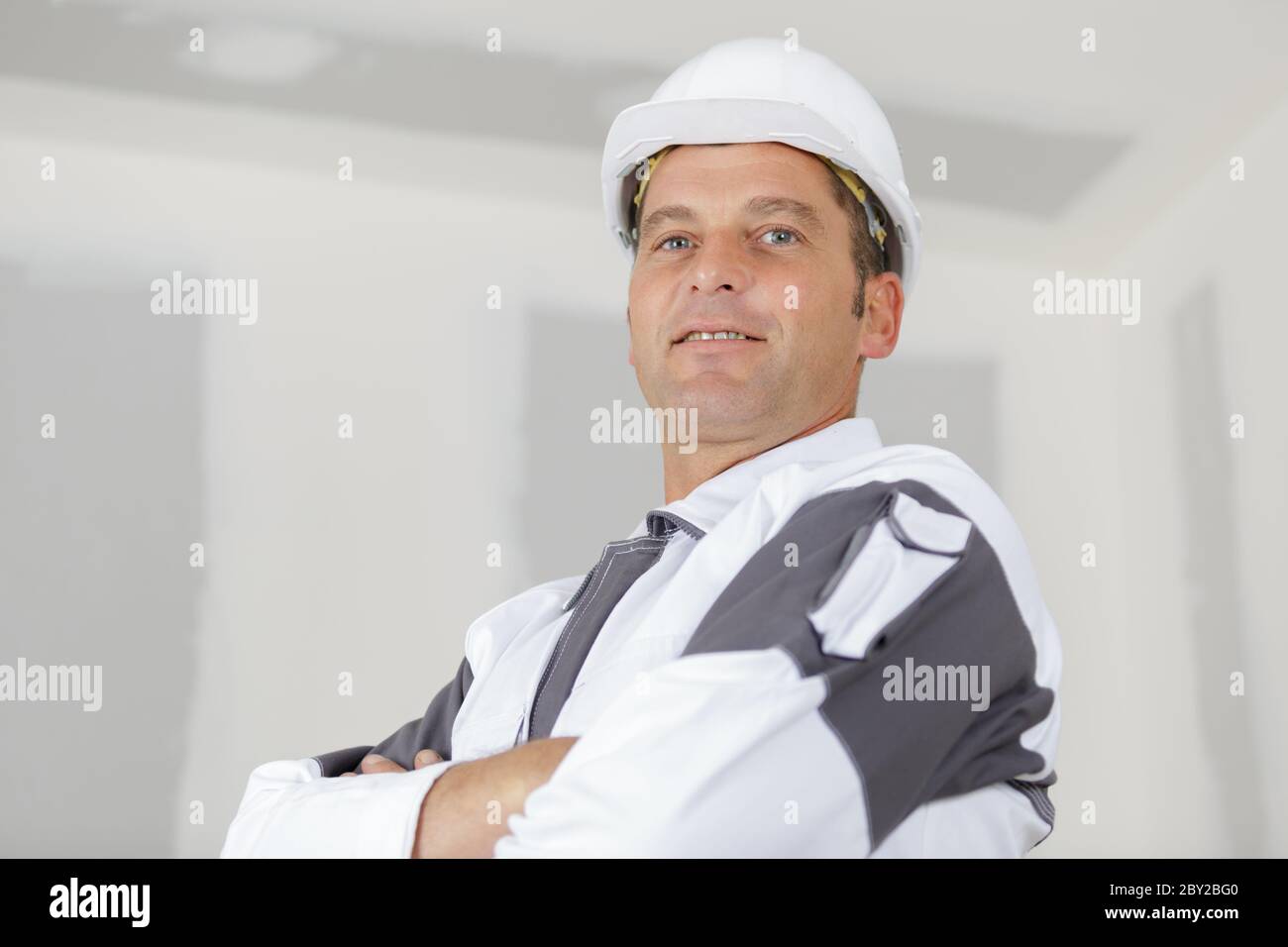 Smiling spanish male worker hi-res stock photography and images - Alamy
