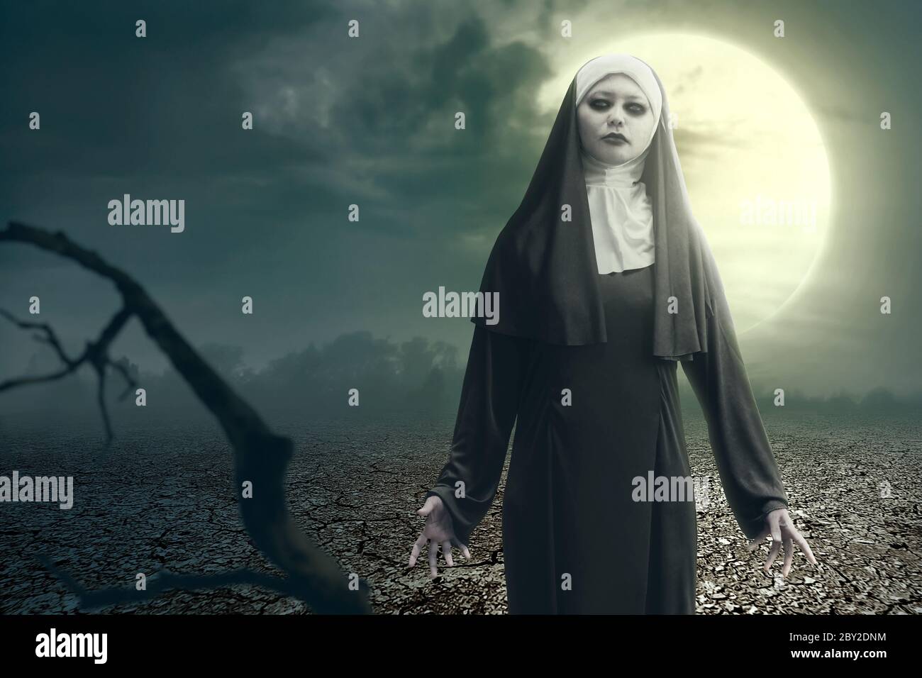 Frightening devil nun with a full moon background. Halloween concept ...