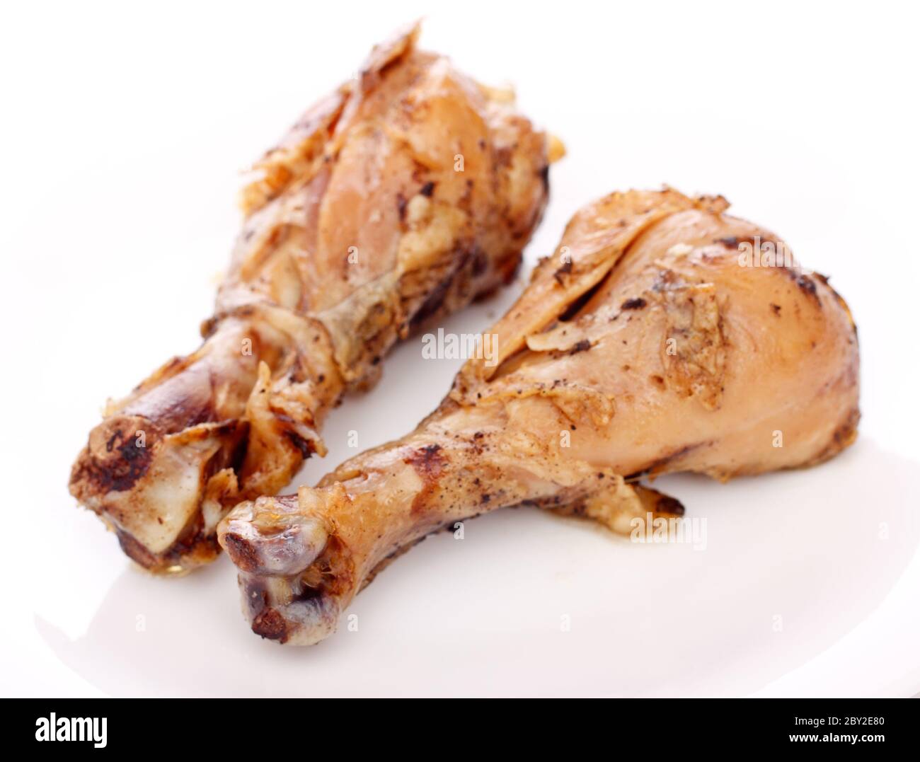 Two Fried Chicken Legs Stock Photo - Alamy