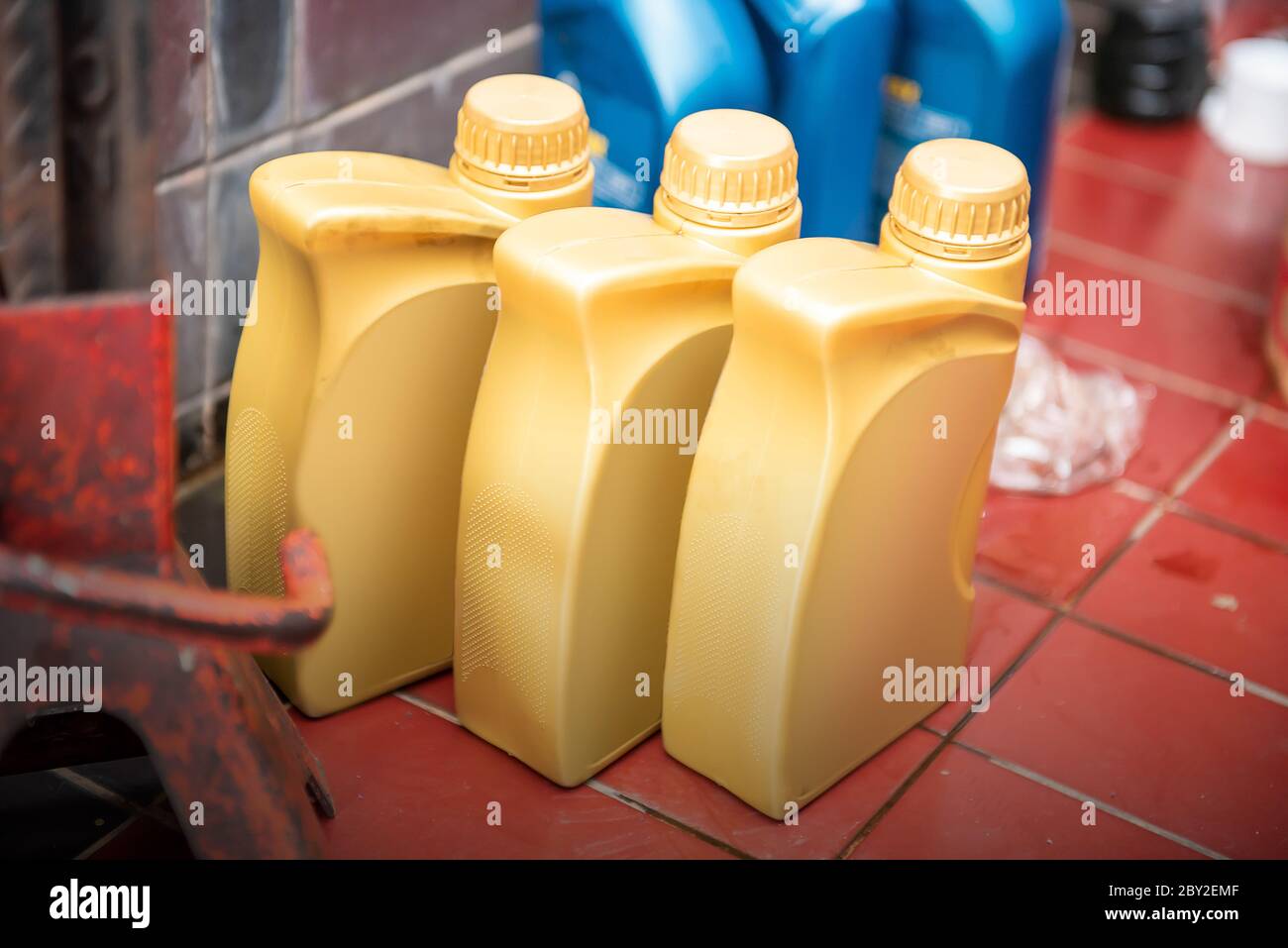 A row of car oil on the garage floor Stock Photo - Alamy