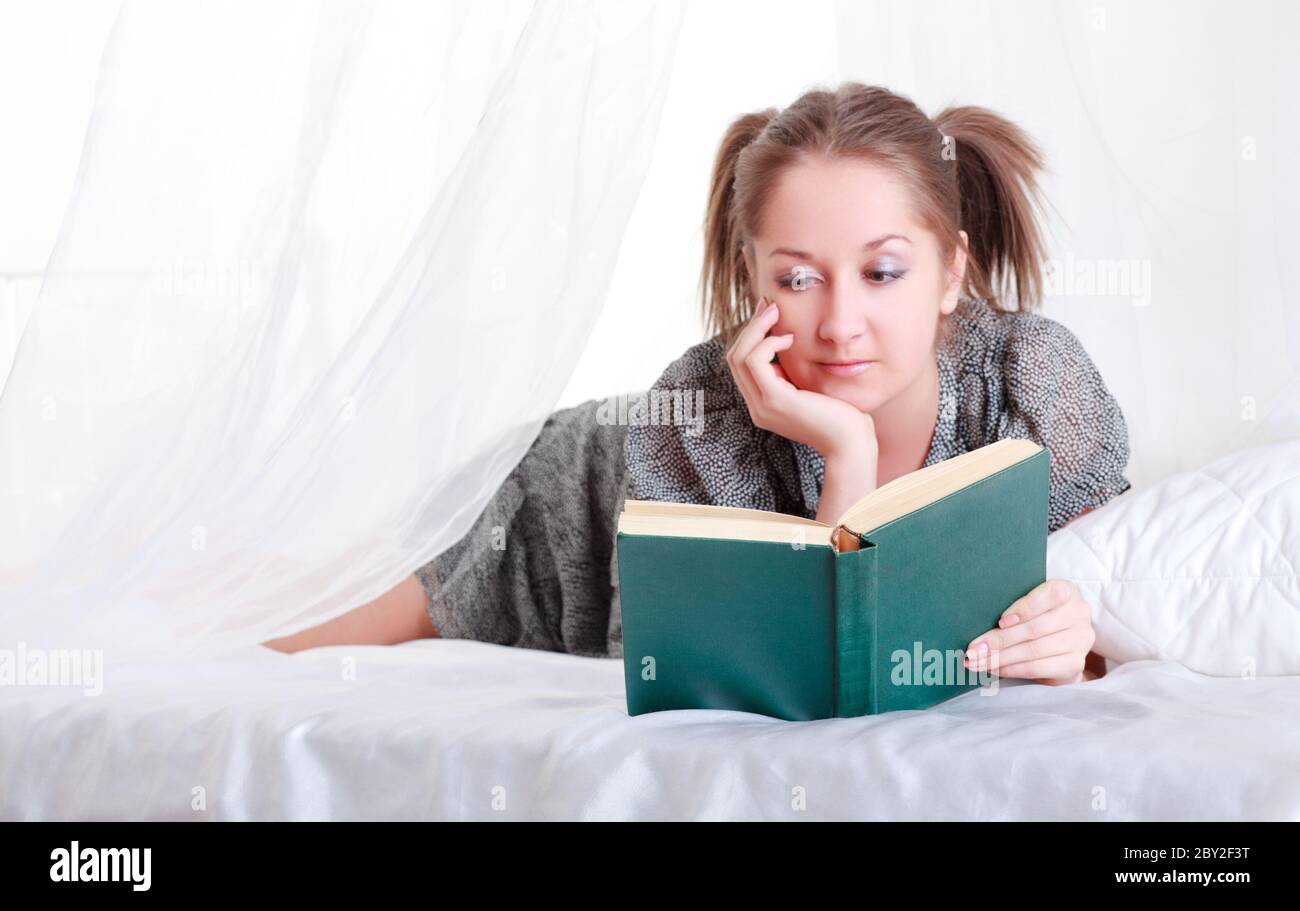 Girl Reading A Book Stock Photo - Alamy