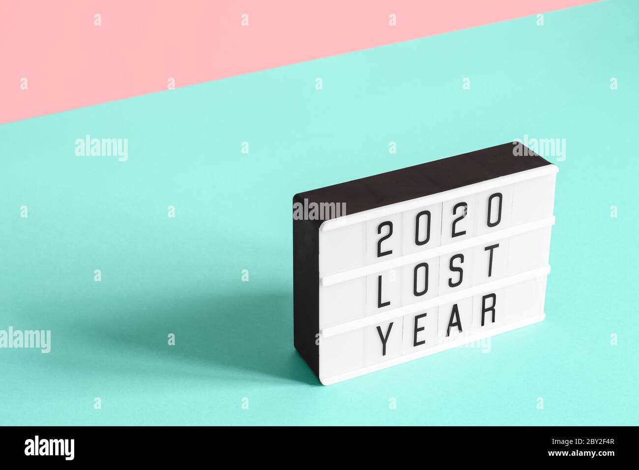 2020 lost year concept. Lightboard with text 2020 lost year on paper ...