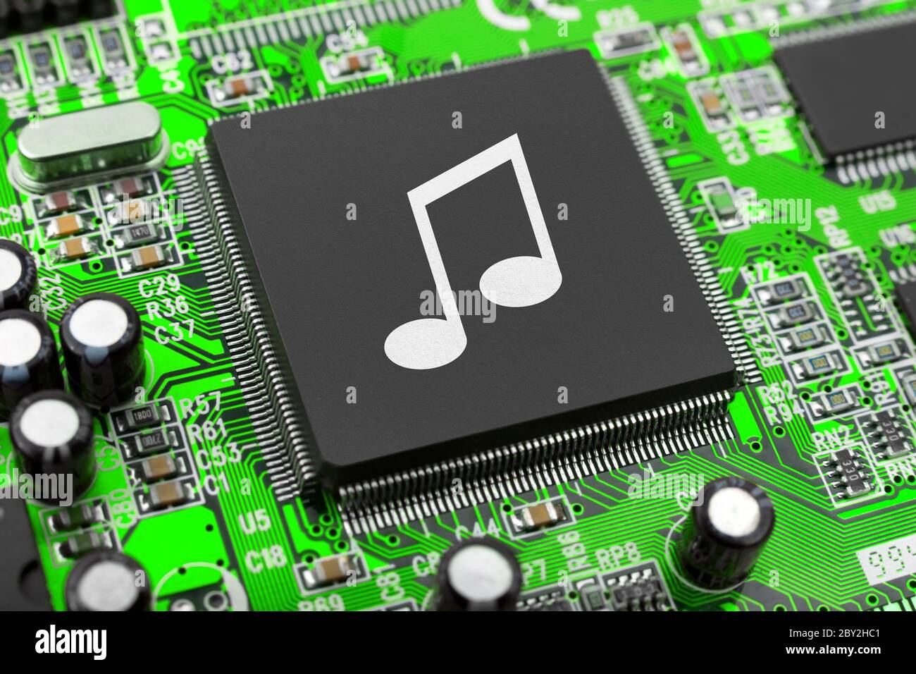 Music note on computer chip Stock Photo - Alamy