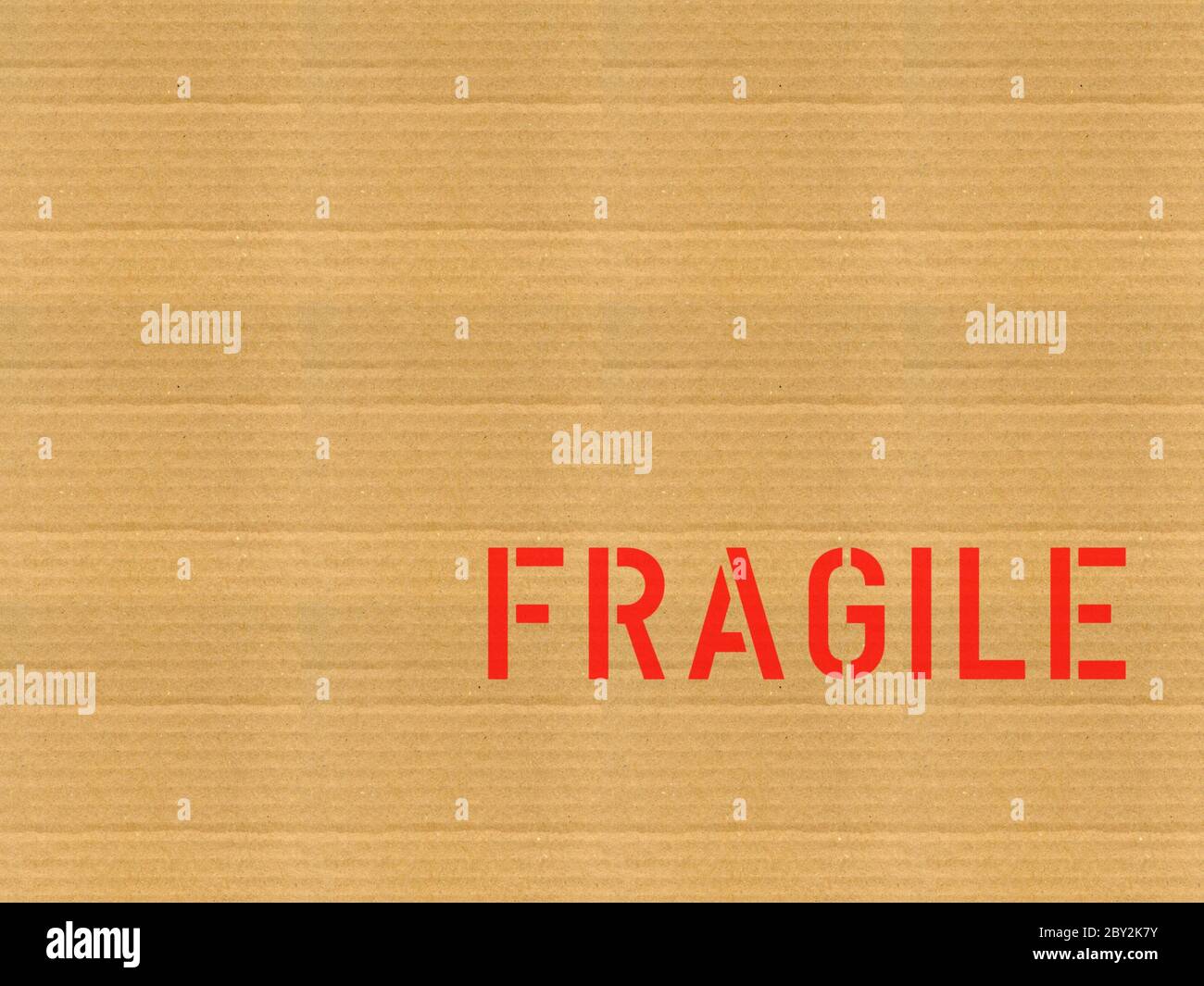 Fragile corrugated cardboard Stock Photo - Alamy