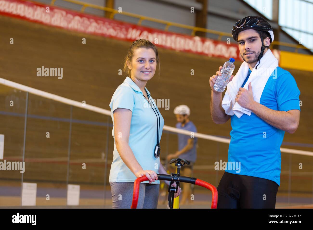 coach and cyclist at a velodrom Stock Photo - Alamy