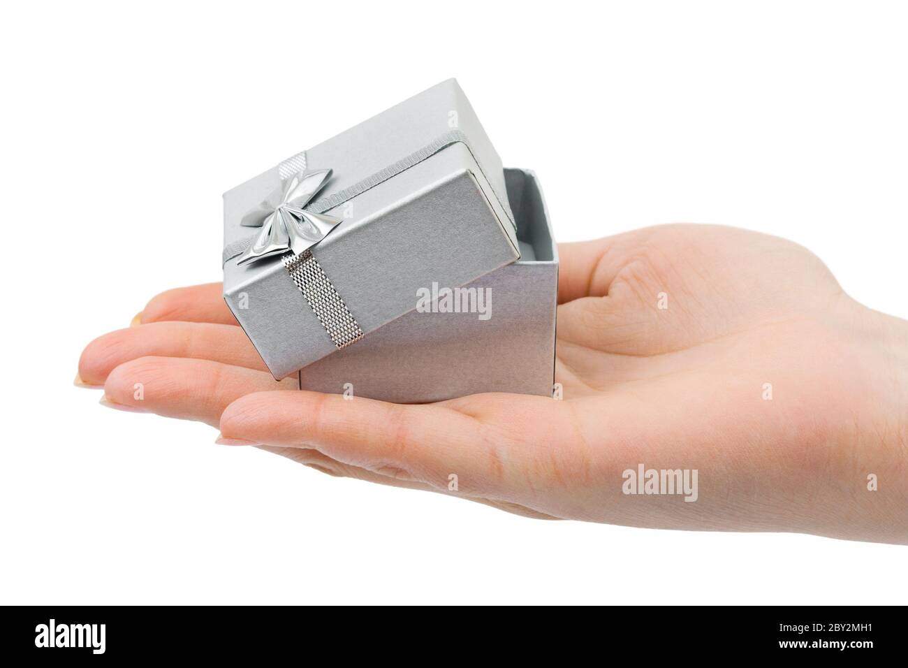 Hand and gift Stock Photo - Alamy