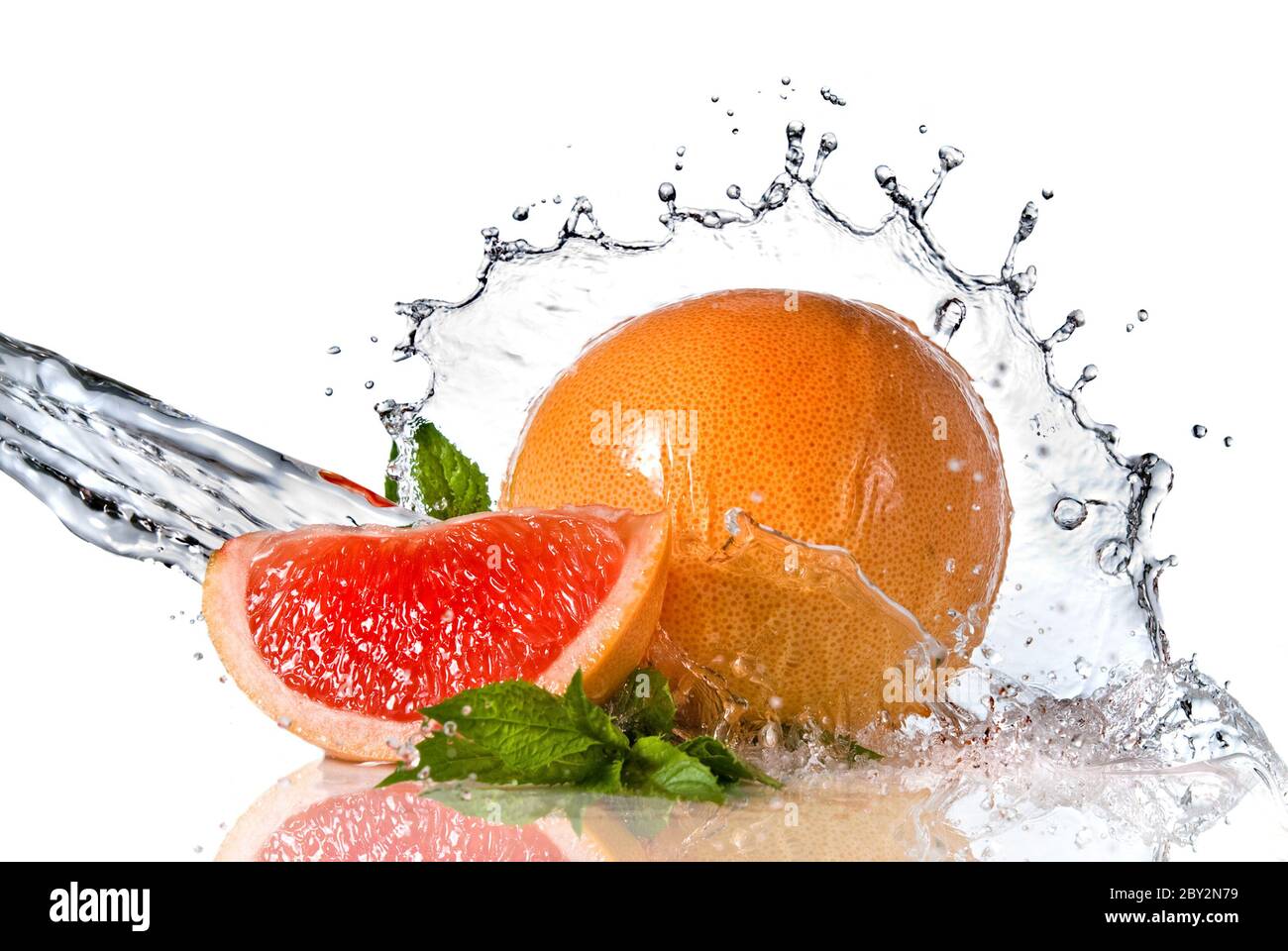 Water splash on grapefruit with mint isolated on white Stock Photo - Alamy