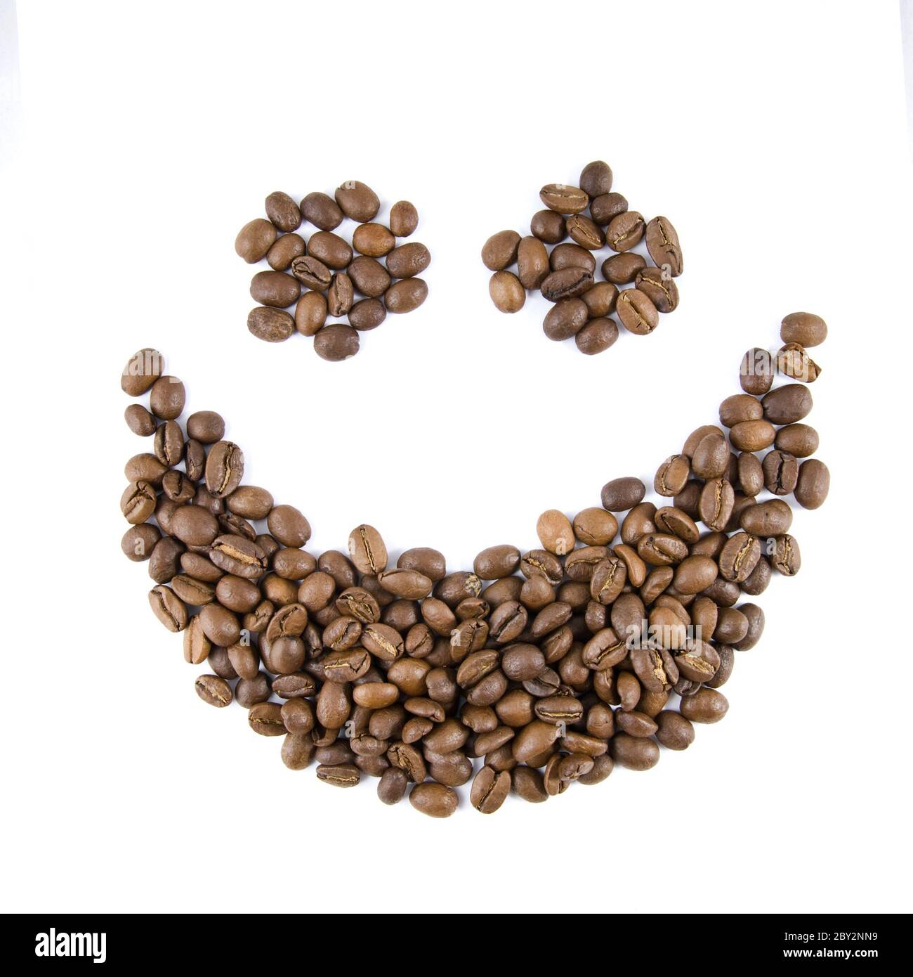 smile from coffee beans isolated on white Stock Photo - Alamy