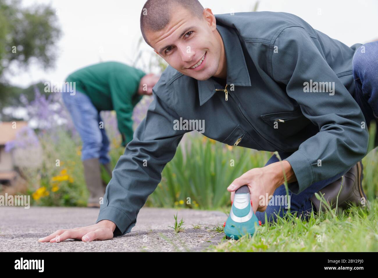 Male landscaper hi-res stock photography and images - Alamy