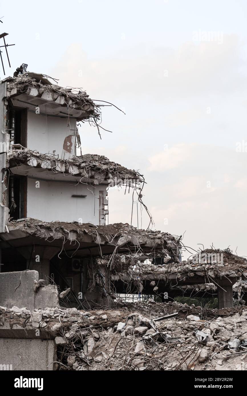 Urban scene. Dismantling of a house. Ruins of building under ...