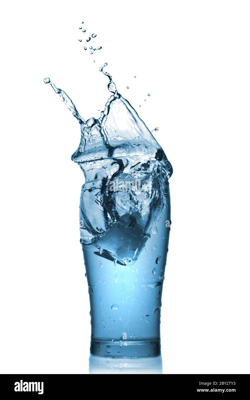 water splash in glass isolated on white Stock Photo - Alamy
