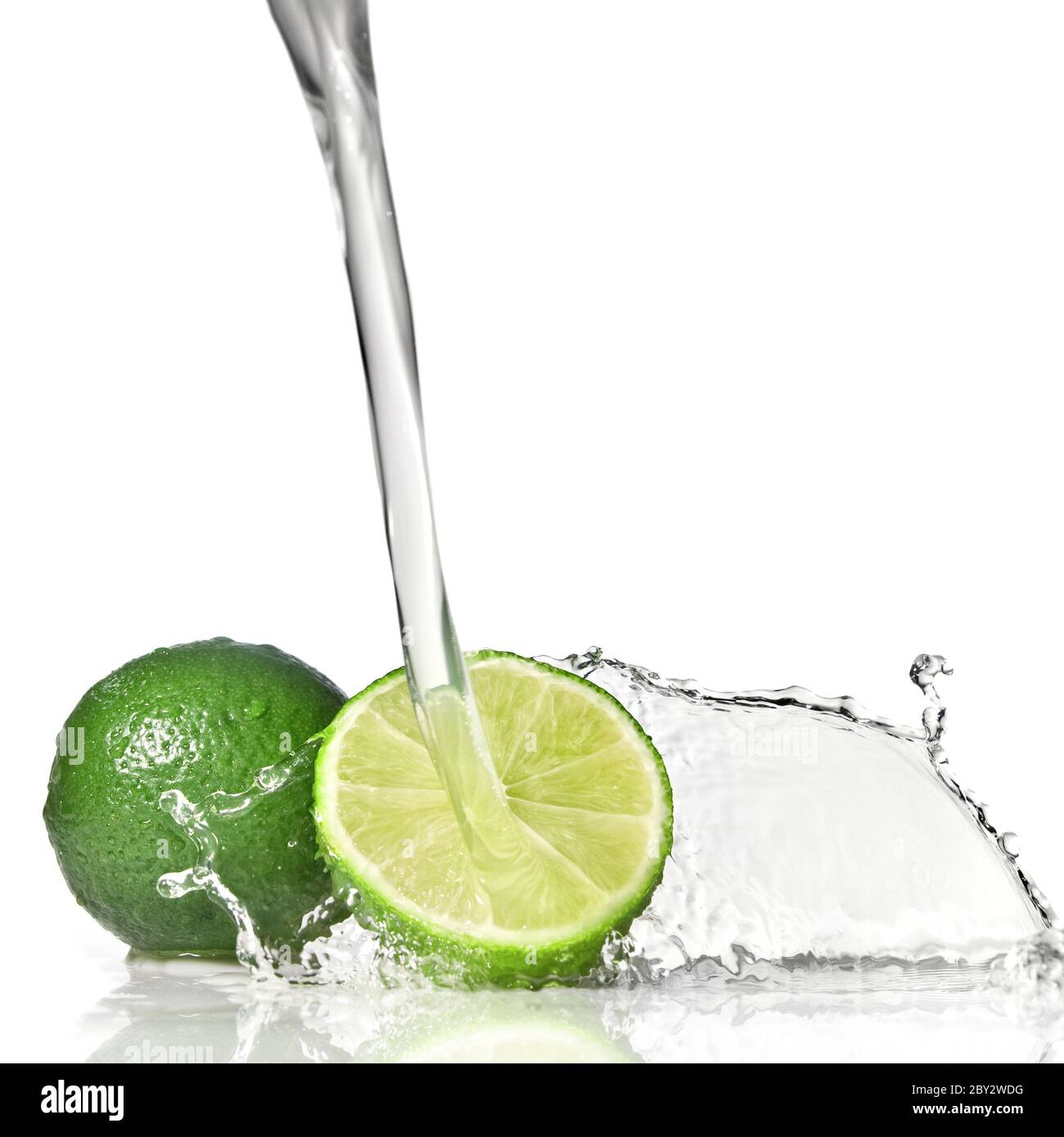 Water splash on lime isolated on white Stock Photo - Alamy