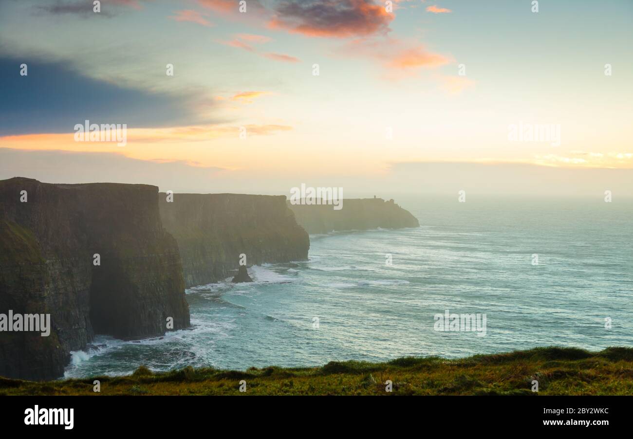 Famous cliffs of Moher at sunset in Co. Clare Ireland Europe. Beautiful ...