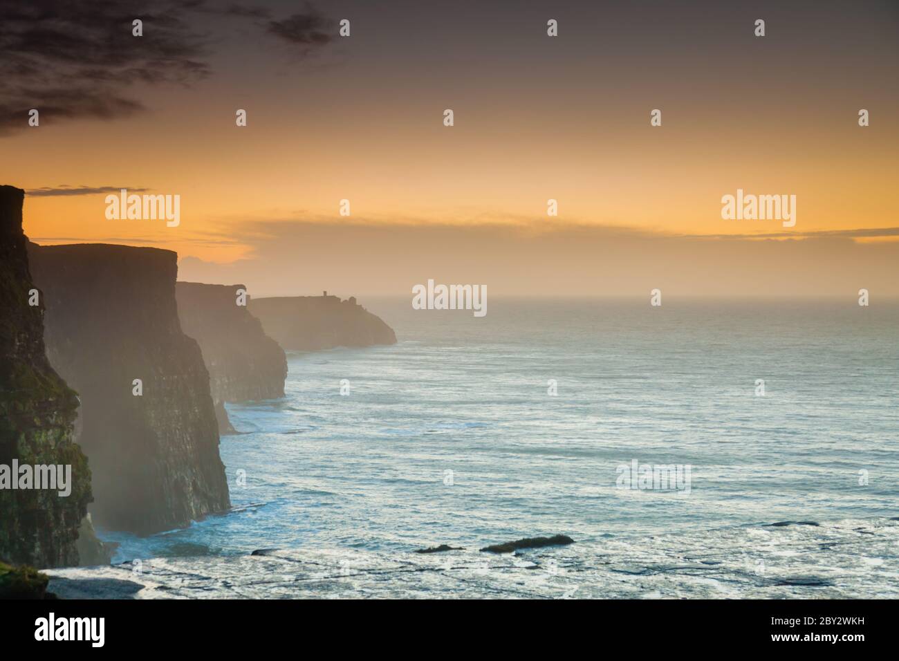 Famous cliffs of Moher at sunset in Co. Clare Ireland Europe. Beautiful ...