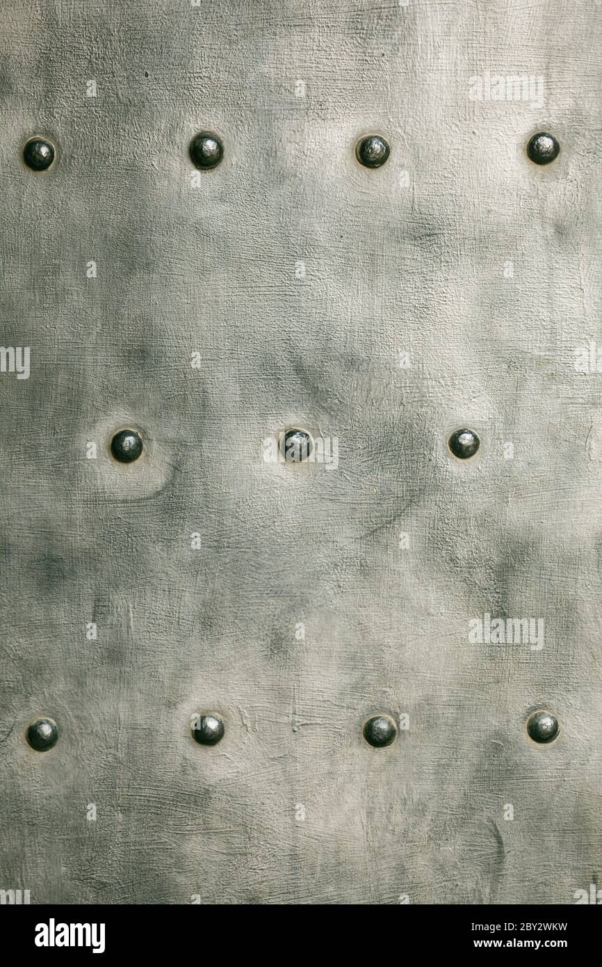 grunge metal plate or armour texture with rivets as background Stock ...