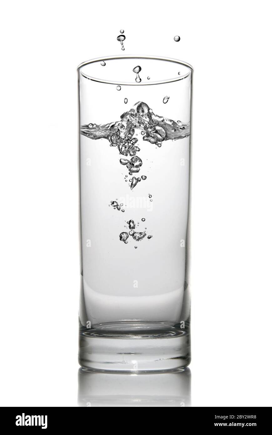 water splash in glass isolated on white Stock Photo - Alamy