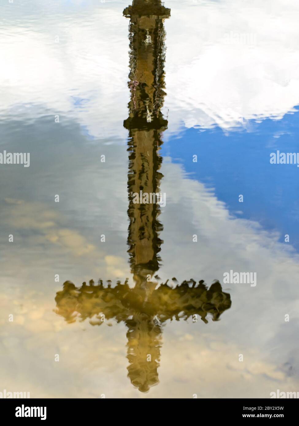 cross reflection in water Stock Photo - Alamy