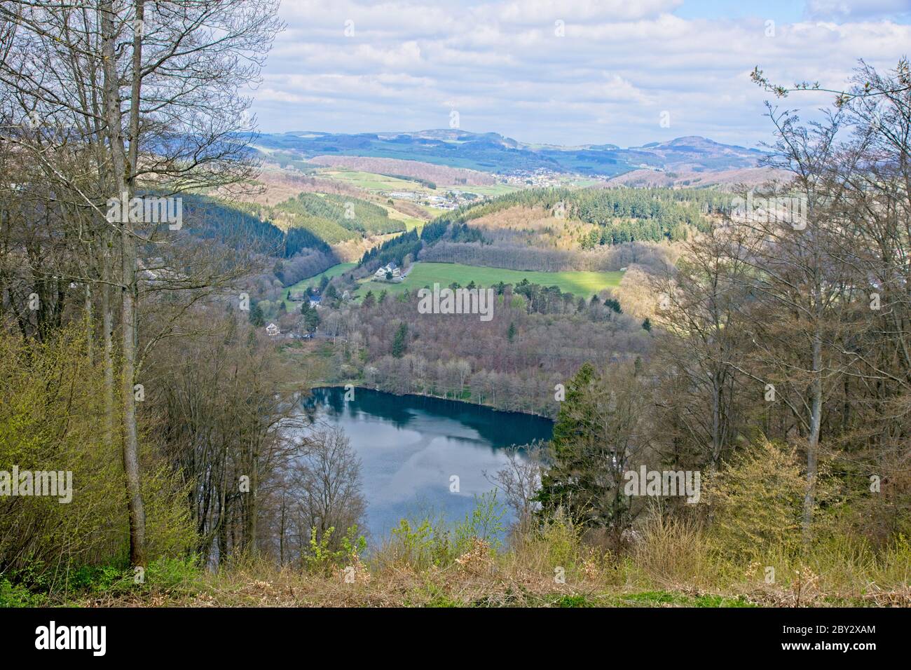 Lake (Gemundener maar) in the Volcanic Eifel or Vulkan Eifel mountains ...