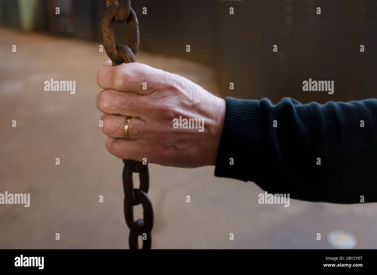 hand and the chain Stock Photo - Alamy