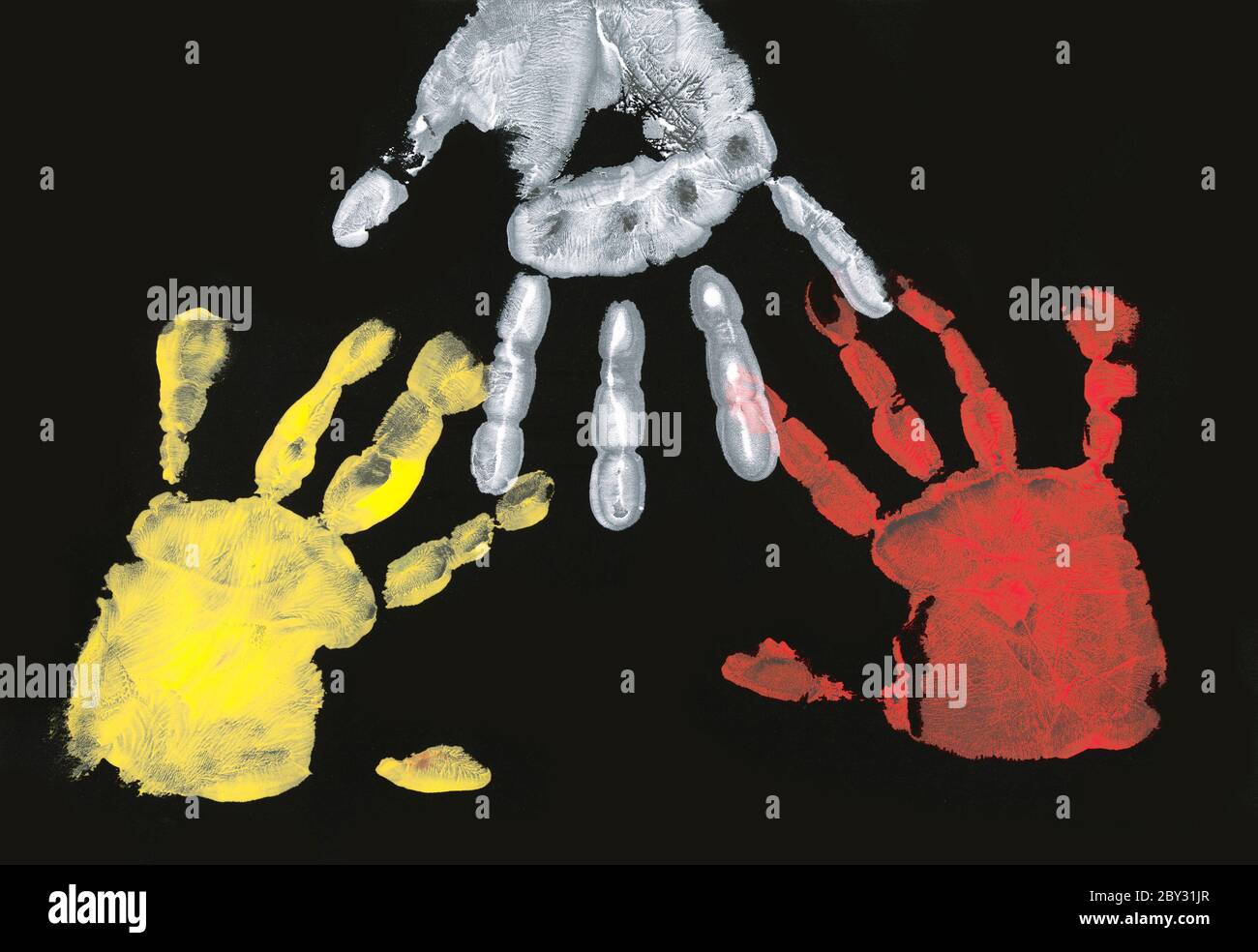 Set of colorful hand prints on black Stock Photo - Alamy