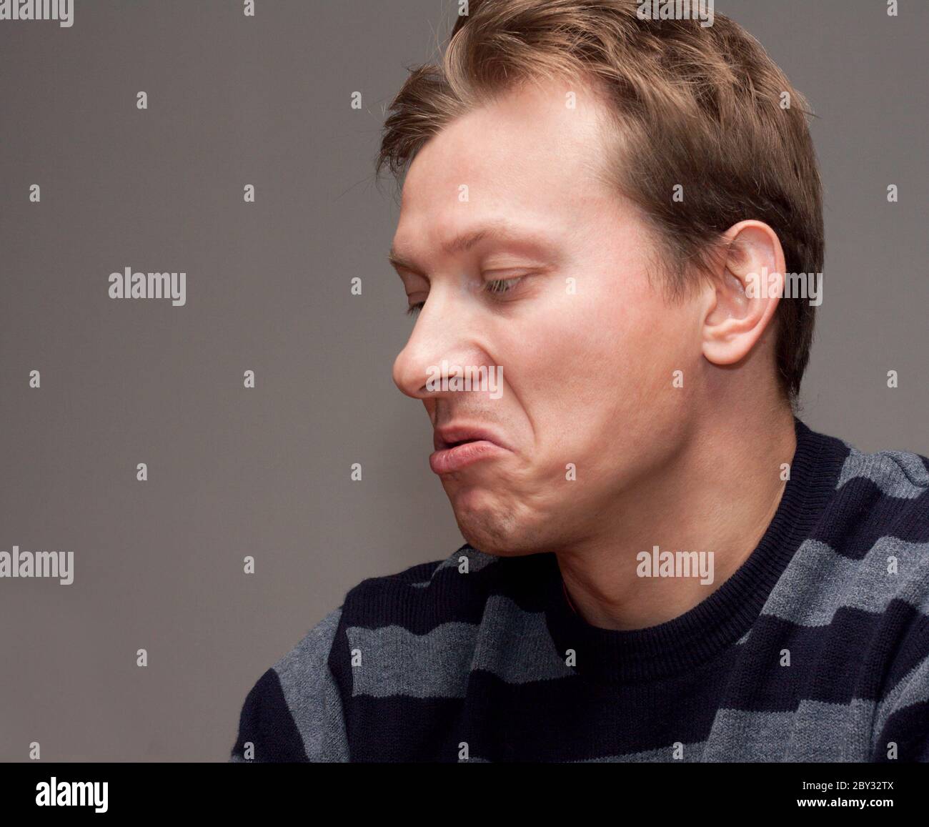 Man writhes person Stock Photo - Alamy