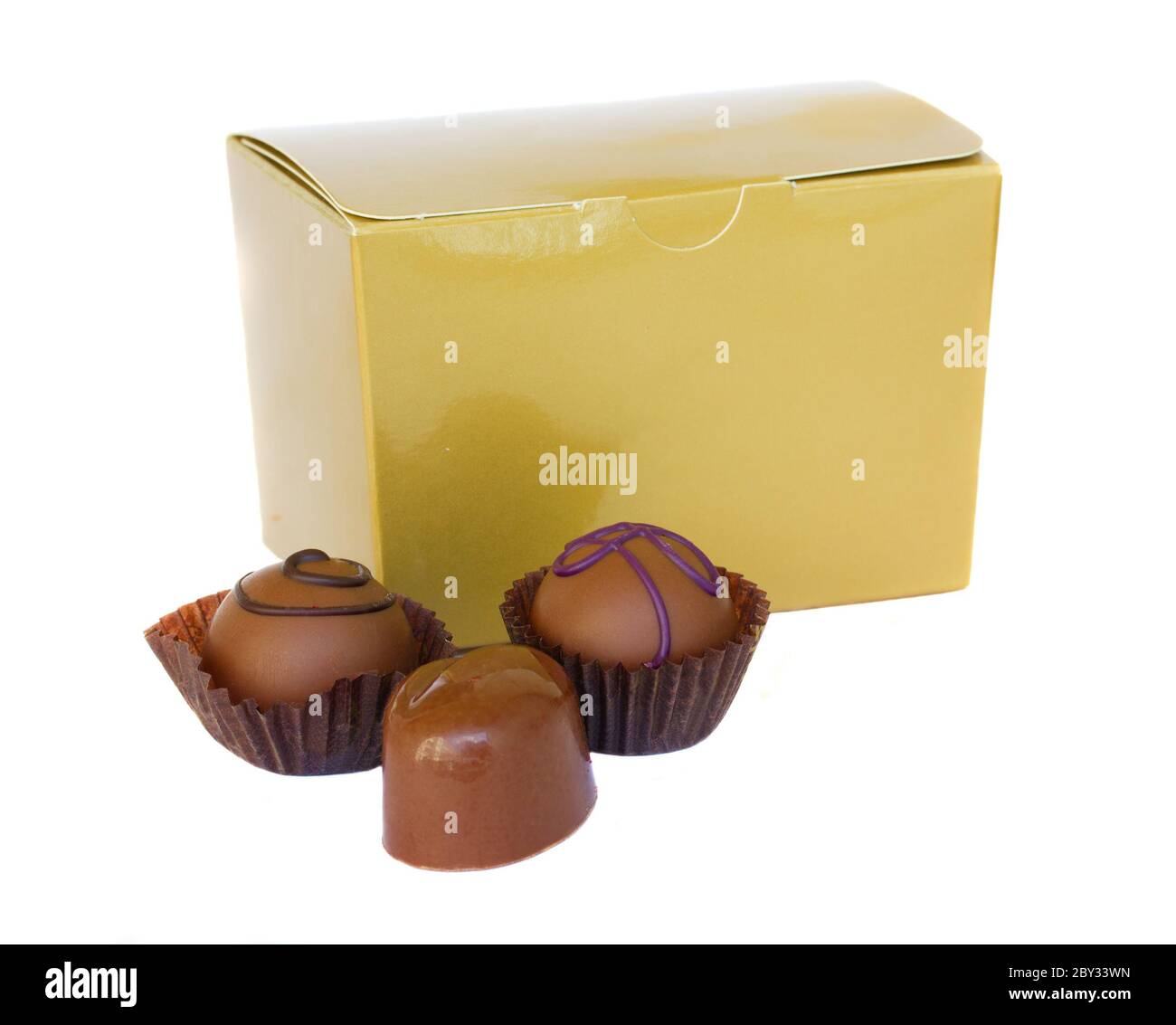 chocolate sweets with golden box Stock Photo - Alamy