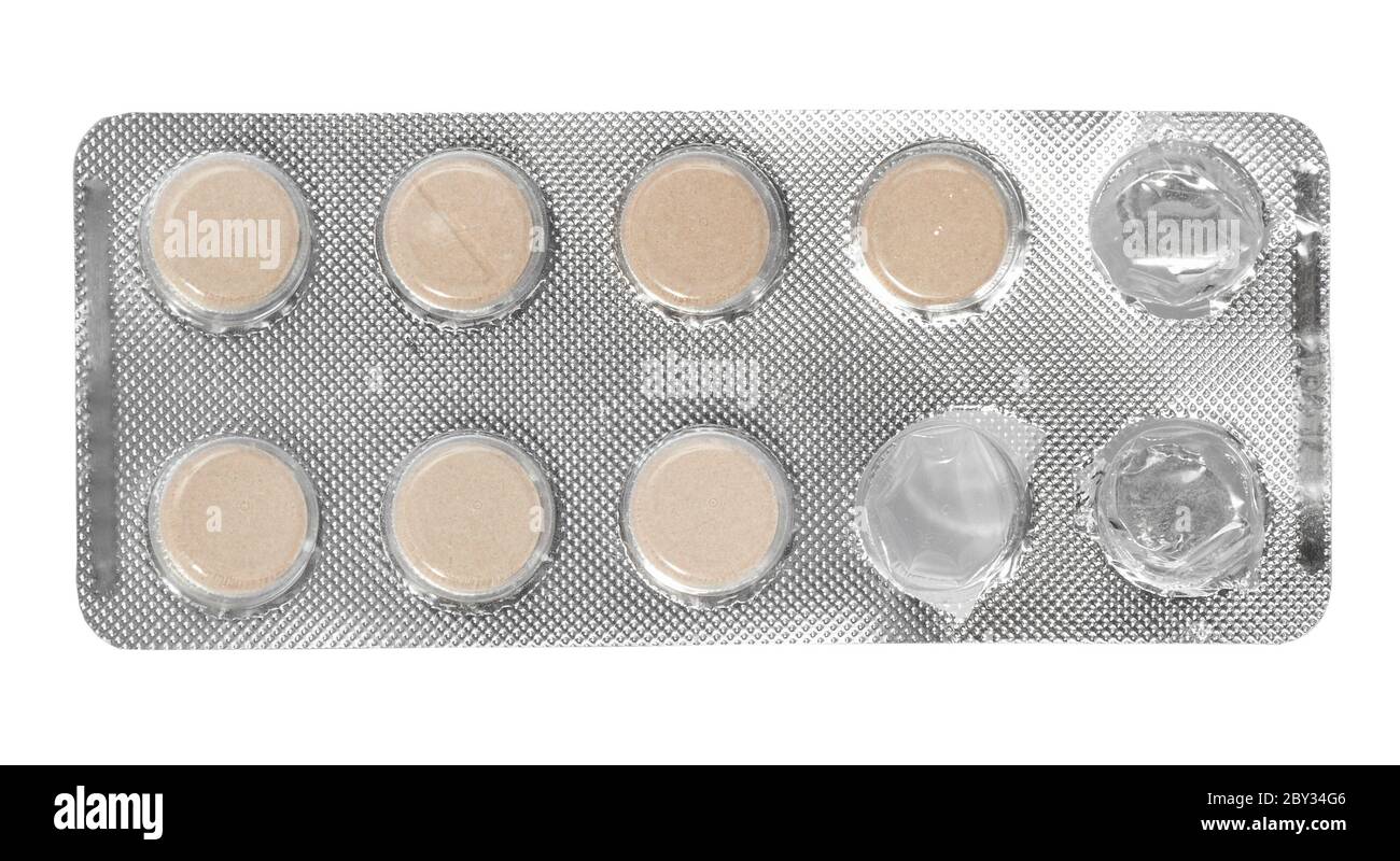Old used pack tablets isolated on white background Stock Photo - Alamy