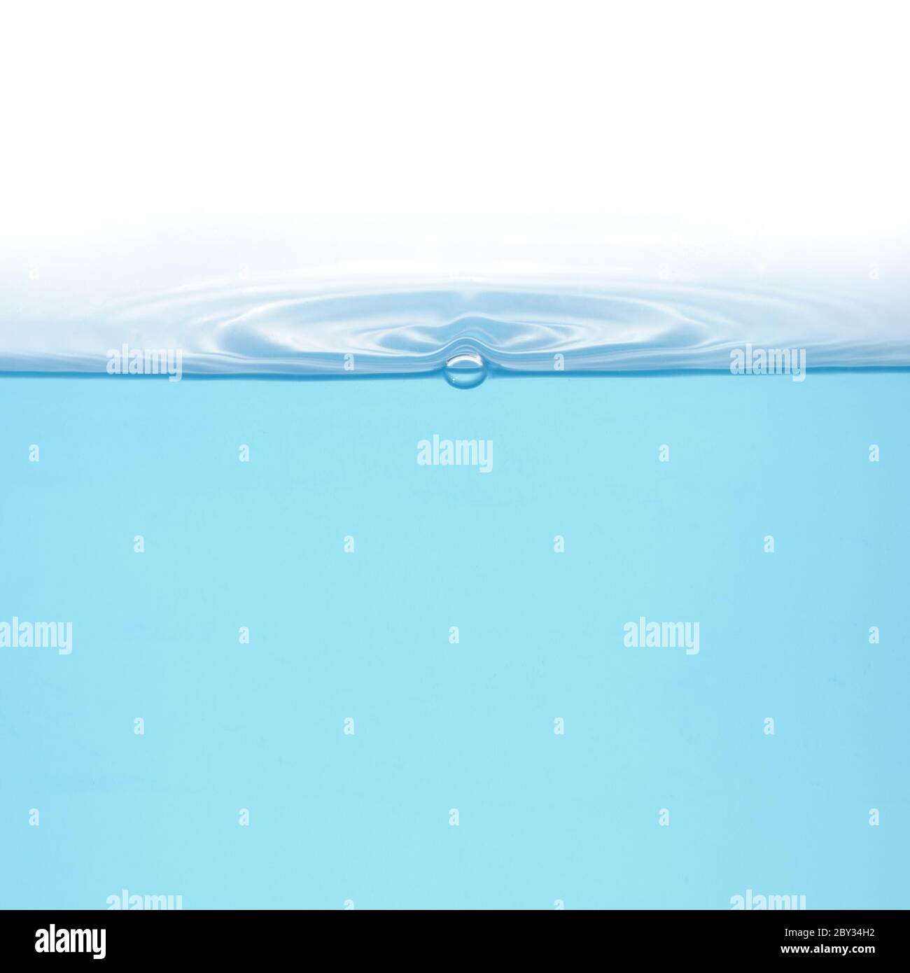 Rings on water isolated Stock Photo - Alamy