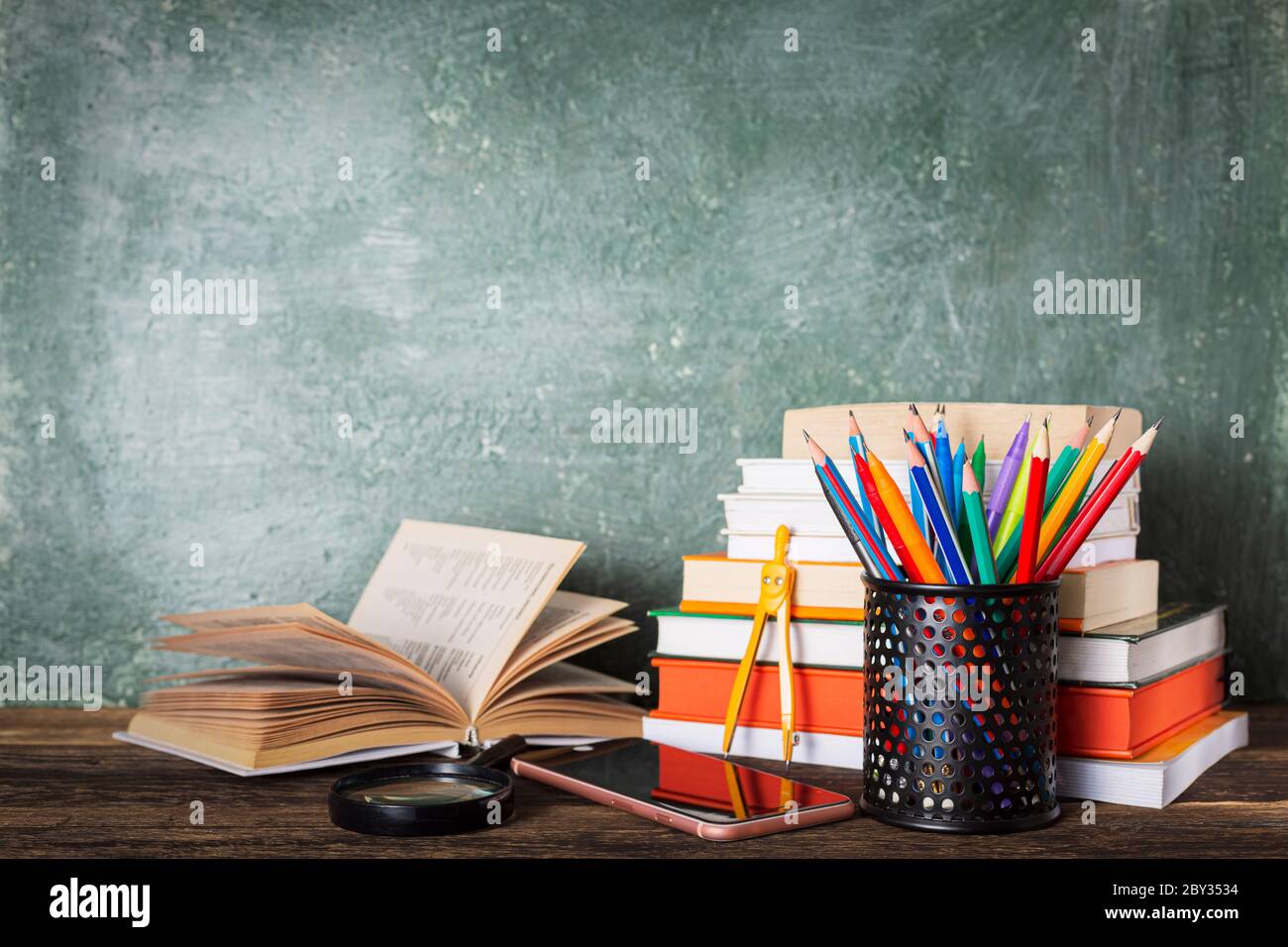 School books on desk, education concept. books on the table in the ...