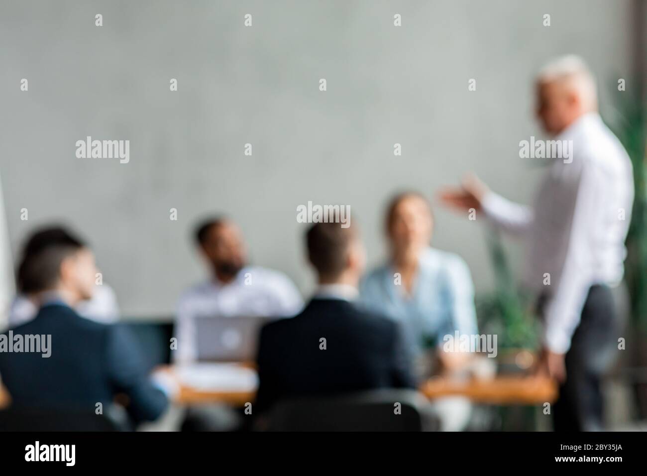 Ceo Giving Speech During Corporate Meeting In Office, Blurred ...