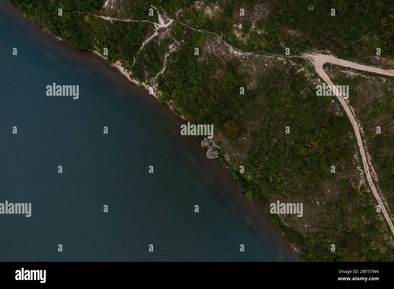 Aerial view of the picturesque landscape of coast washed by water ...