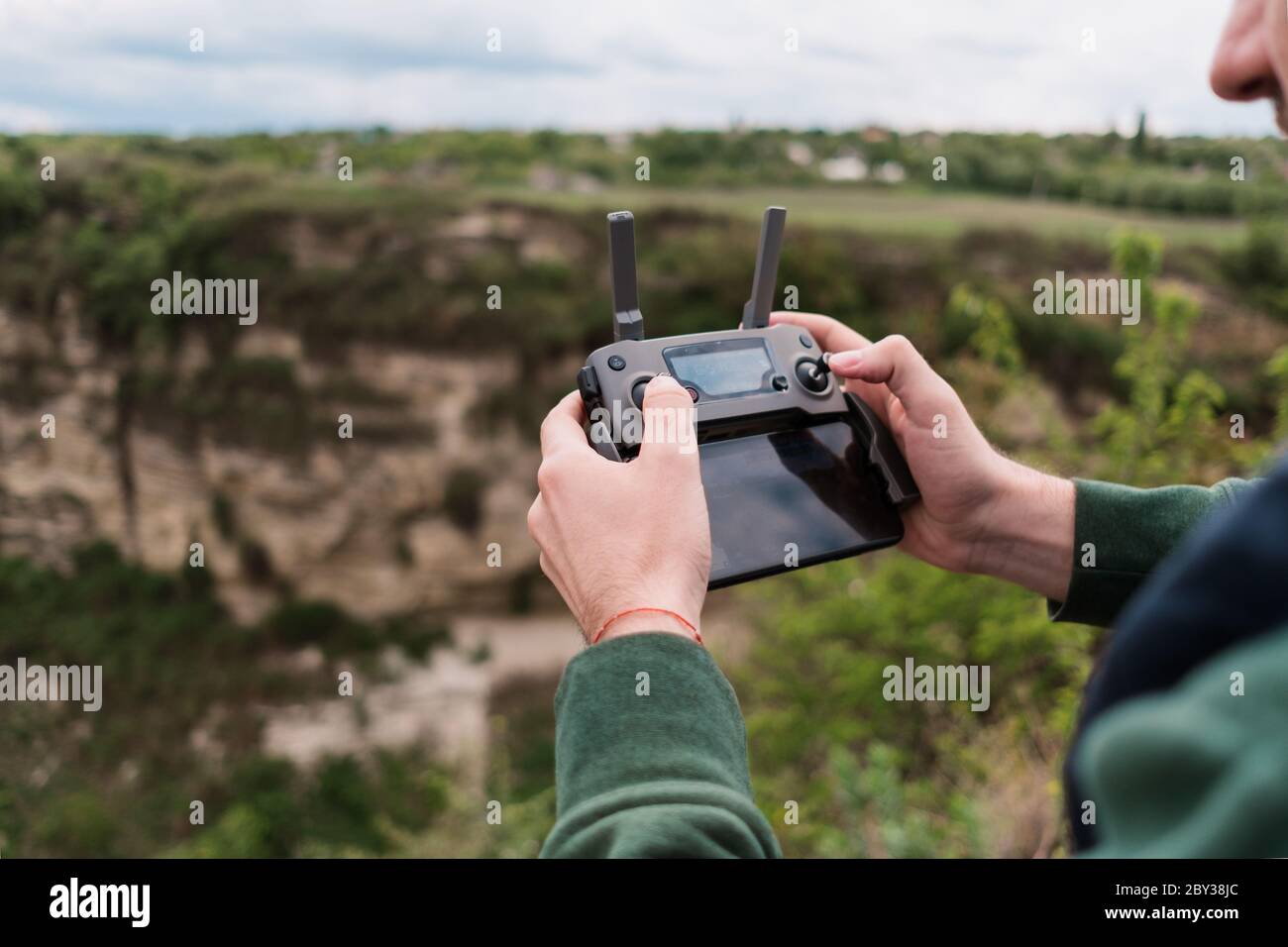 Man landing drone in nature hi-res stock photography and images - Alamy